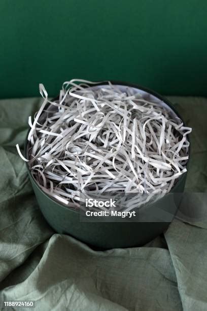 Opened T Box With Decorative Straw Filler Shavings Paper Ribbons Cut