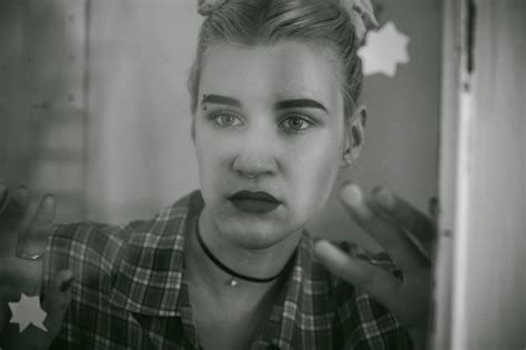 Premium Photo Close Up Of Young Woman Looking Through Window Seen