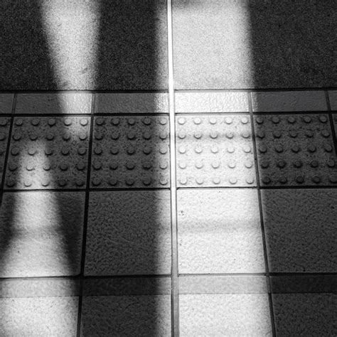 Premium Photo High Angle View Of Shadow On Sidewalk