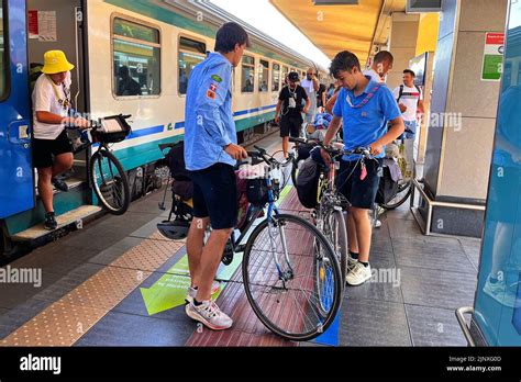 Boy Scouts Get Off The Train With Their Bicycles Milan Italy August