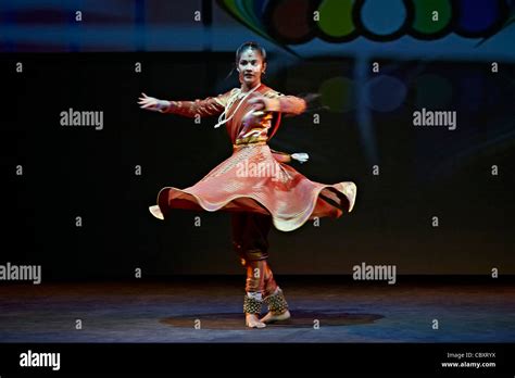 Asian Indian Female Dancer In Spinning Motion With Swirling Skirt Stock