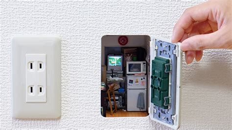 Remarkably Detailed Miniature Rooms Hidden Behind Faux Electrical Outlets