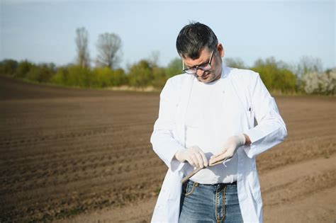 Premium Photo Soil Sampling Agronomist Taking Sample With Soil Probe
