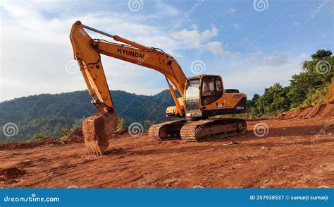 Excavators Are Preparing For The Mining Process Of Embankment Editorial