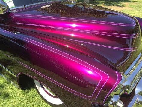 Custom Black Car With Purple Stripes