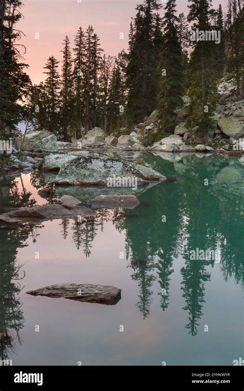 Sunrise Lights Up Clouds To The East Of Delta Lake In Grand Teton