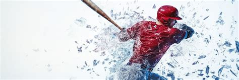 A Baseball Player In A Red Uniform Swings A Bat With Intense Force