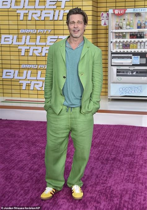 Brad Pitt Rocks A Colorful Green Suit While Hitting The Red Carpet At