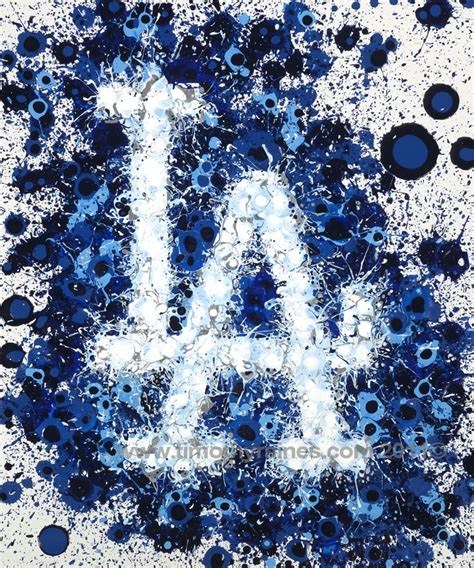 The Letters Are Made Up Of Blue And White Paint Splattered On Top Of