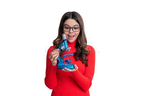 Teen School Girl Study Biology Science With Microscope Stock Image