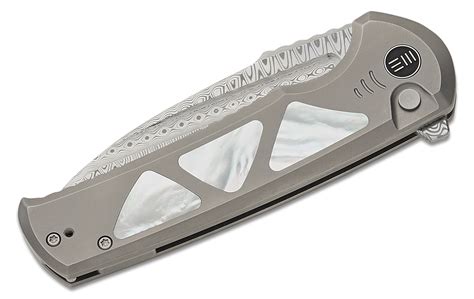 We Knife Company Sylox Button Lock Flipper Knife 38 Hugin Damasteel