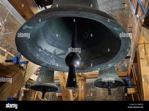 A View Of Massive Church Bells Hanging From The Bell Tower Of Muenster