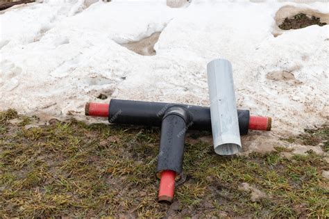 Premium Photo Tee Pipe For Heating Insulated Pipe In A Plastic Coating For The Installation Of