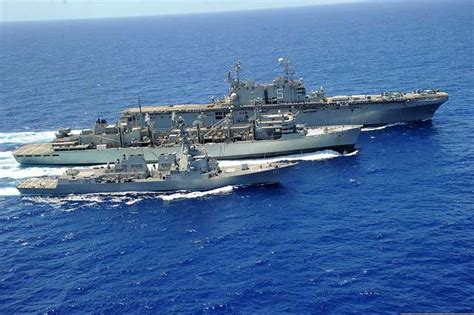 The Amphibious Assault Ship Uss Peleliu Lha 5 Top And The Guided