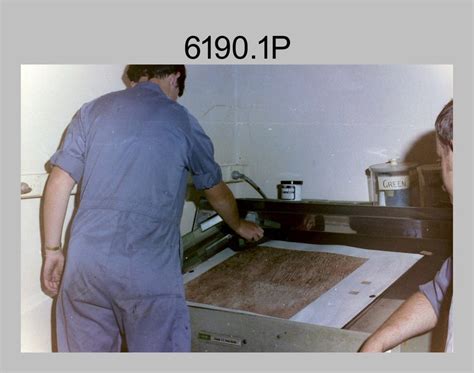 Photograph Lithographic Technicians Preparing A Cromalin Map Proof At