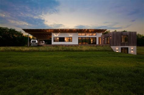 Haus Wraps Low Lying Indiana Residence In Thermally Treated Ash