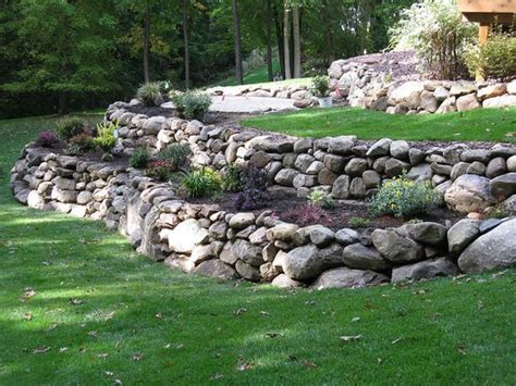 Retaining Rock Wall Ideas For A Sloped Yard Rock Wall Landscaping