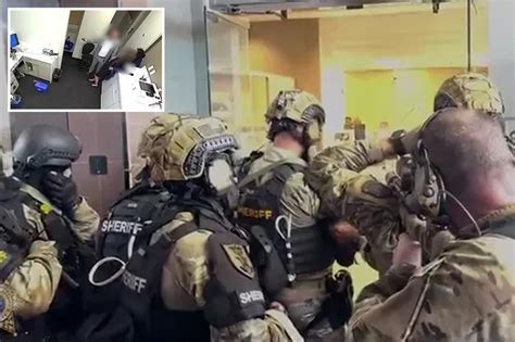 Incredible Footage Shows Sniper Shoot Bank Robber Through Computer And