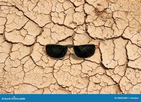 Sunglasses On Dry Crack Earth Texture Stock Image Image Of Grunge