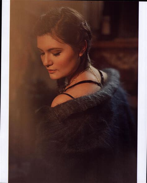 Phillipa Soo Looking Over Shoulder In Gray Fuzzy Jacket Photo Print Item Mvm55025 Posterazzi