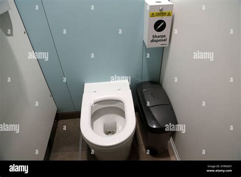 Sharps Disposal Bin In Public Toilet Heathrow Airport England Stock Photo Alamy
