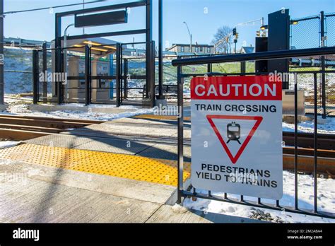 Mbta Green Line Caution Sign At Ball Square Station In Medford And