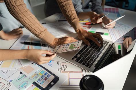 Creative Ux Ui Design Process With Team Collaborating On Mobile App Interface Prototypes And