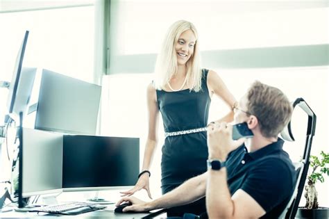 premium photo business people looking at data on multiple computer