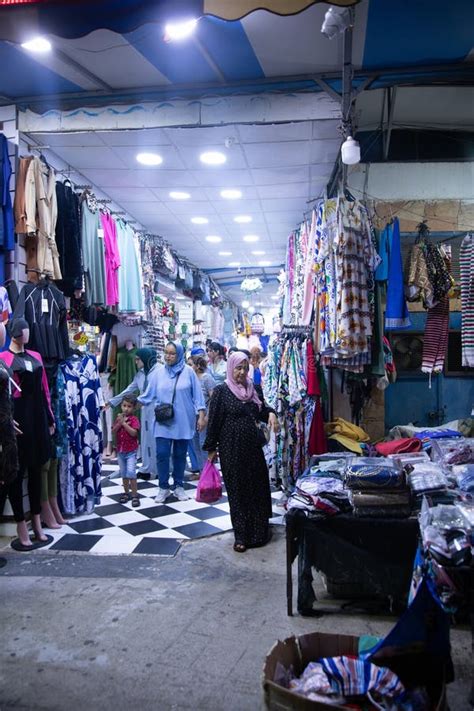 Covered Market Alley With Shoppers And Traditional Fashion In Martil