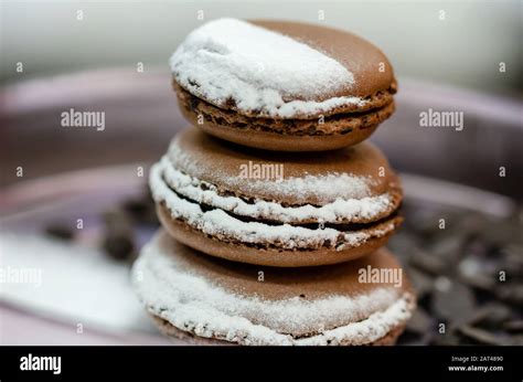 French Macarons With Powdered Sugar And Chocolate Close Up Stock