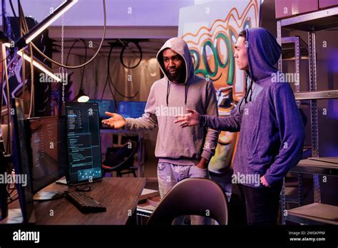 Hackers Discussing Hacking Plan And Cybercrime Technique Criminals In