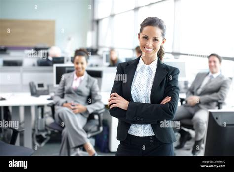 Happy In Her Career Choices Attractive Young Businesswoman Standing