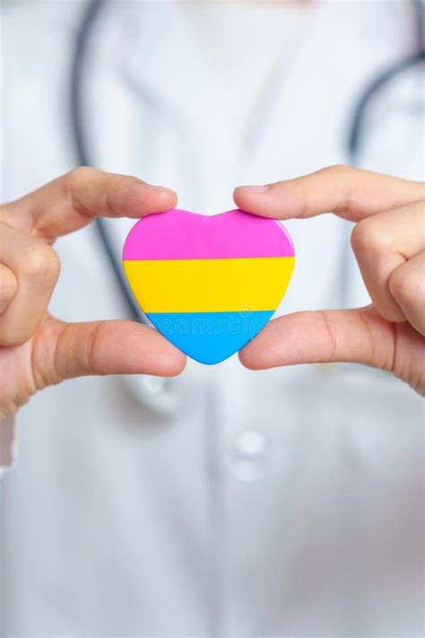 Pansexual Pride Day And Lgbt Pride Month Concept Doctor Hand Holding Pink Yellow And Blue