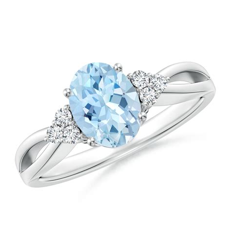 Oval Aquamarine Side Stone Ring With Diamonds
