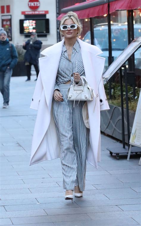Ashley Roberts Wears White Retro Sun Glasses And Light Blue Pinstripe