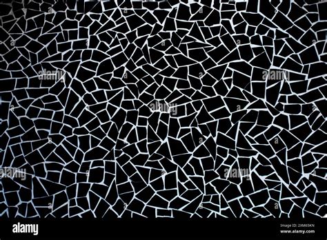 Stunning Black And White Mosaic Tile Work Featuring Angular Shapes Perfect For Contemporary