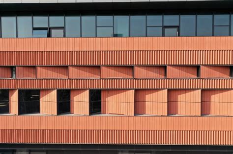 Xinmin Vanke Library In Special Shaped Terracotta Facade Architecture