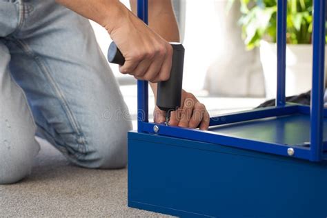 Diy Furniture Assembly At Home With Cordless Drill In Modern Living