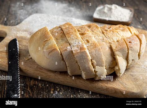 Cut Fresh Bread Into Pieces While Cooking With Bread The Bread Is Cut