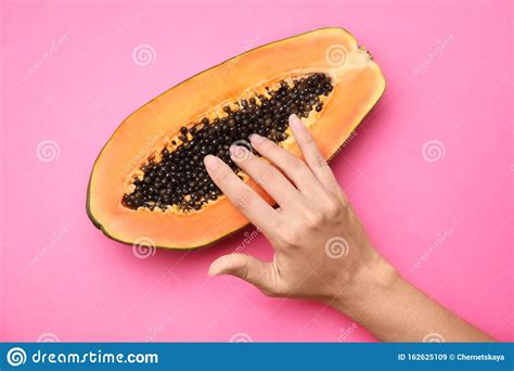 Young Woman Touching Half Of Papaya On Background Top View Sex
