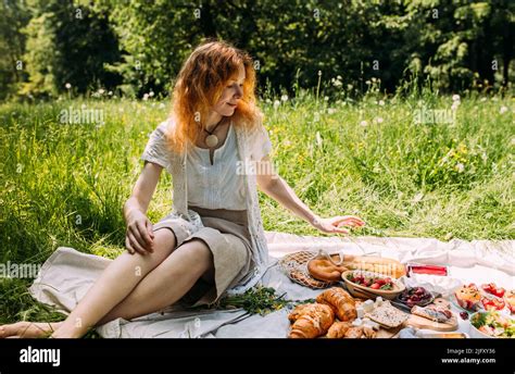 Beautiful Redhead Woman On Picnic She Smiles Eat Strawberrie And