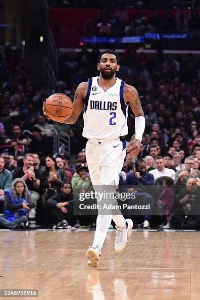 Kyrie Irving Of The Dallas Mavericks Dribbles The Ball During The