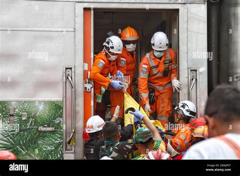 passengers were being evacuated after the crash on the island of java