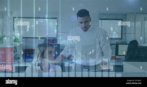 Statistical Data Processing Over Diverse Male And Female Office Colleagues Discussing At Office