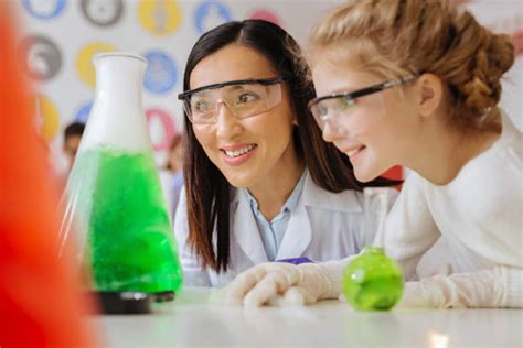 190 Focused Elementary Age Stem Students Work In Science Lab Stock