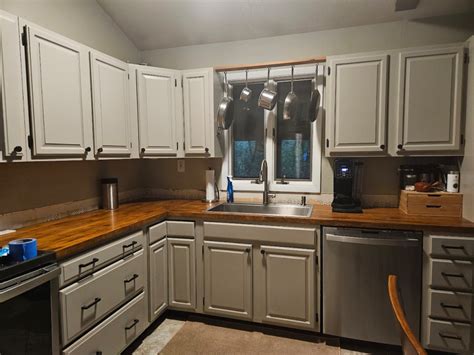 Backsplash Placement With Uneven Window Cabinets