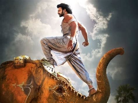 Baahubali 2 Ss Rajamouli Presents Karan Johar With The Famous Katappa