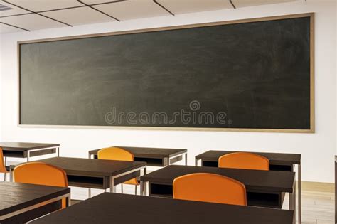 Modern Classroom Interior With Large Blackboard And Empty Desks 3d