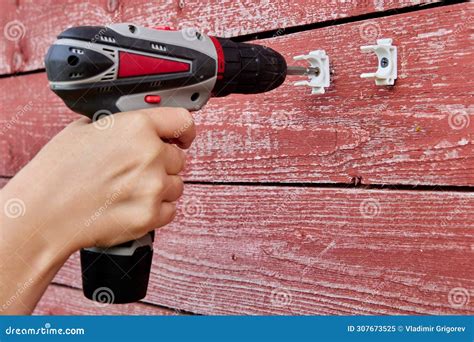 Power Screwdriver Using For Tighten Screws Of Pipe Clamp Holder On