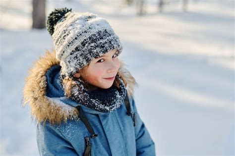 Premium Photo Cute Smiling Boy In Beanie And Jacket
